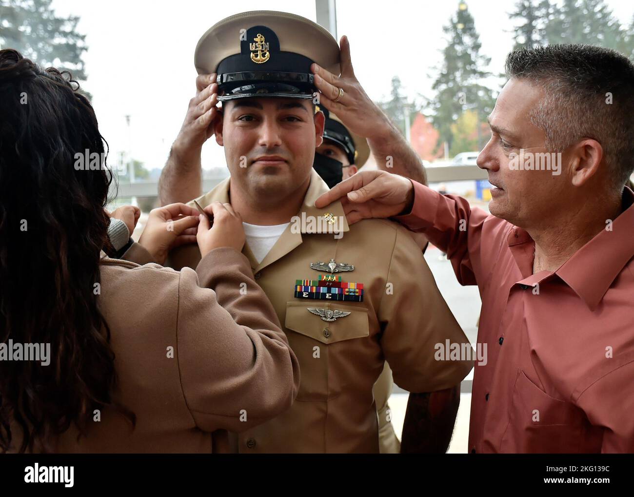 A perfect fit...Chief Gunner’s Mate Tristan Brayman, along with Chief ...