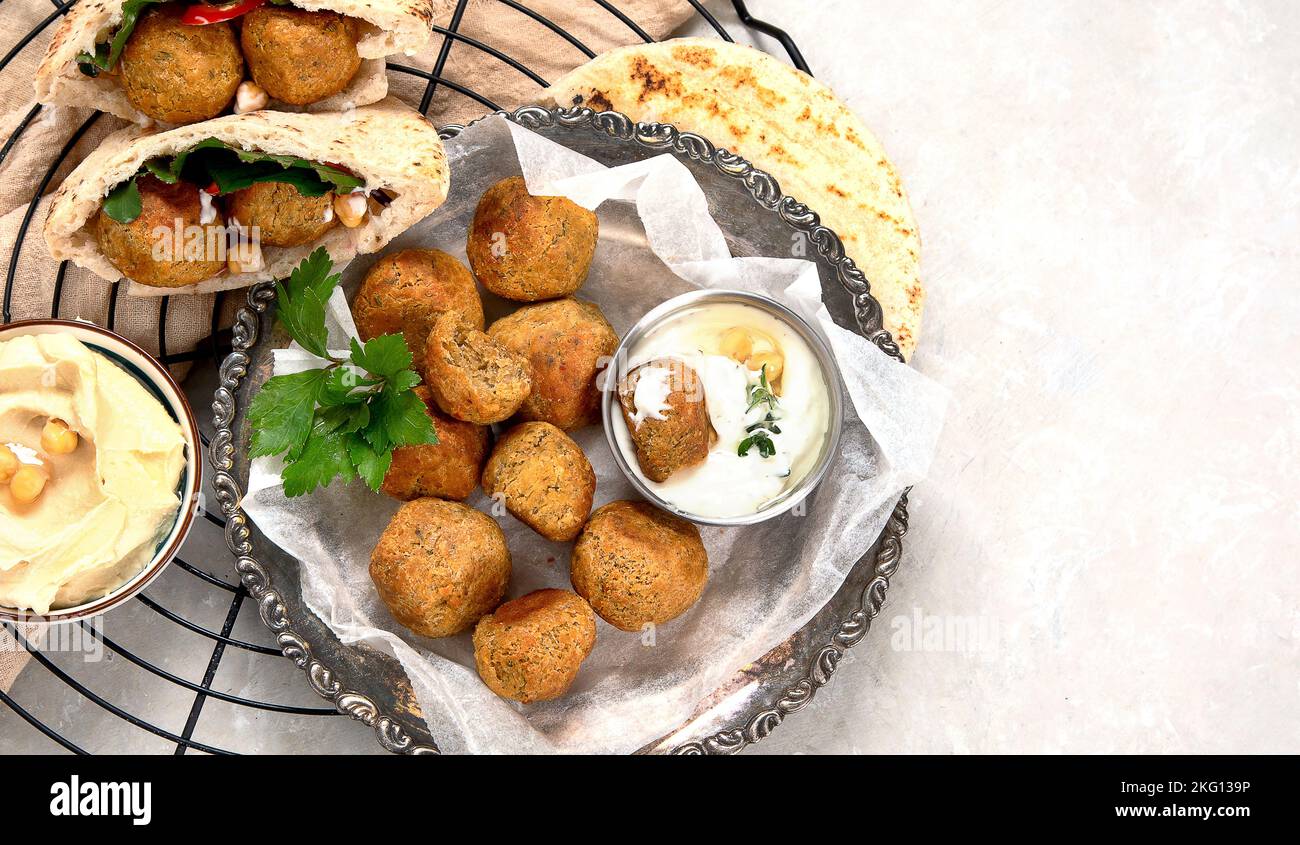 Middle eastern, arabic dishes with falafel, hummus, pita. Halal food ...