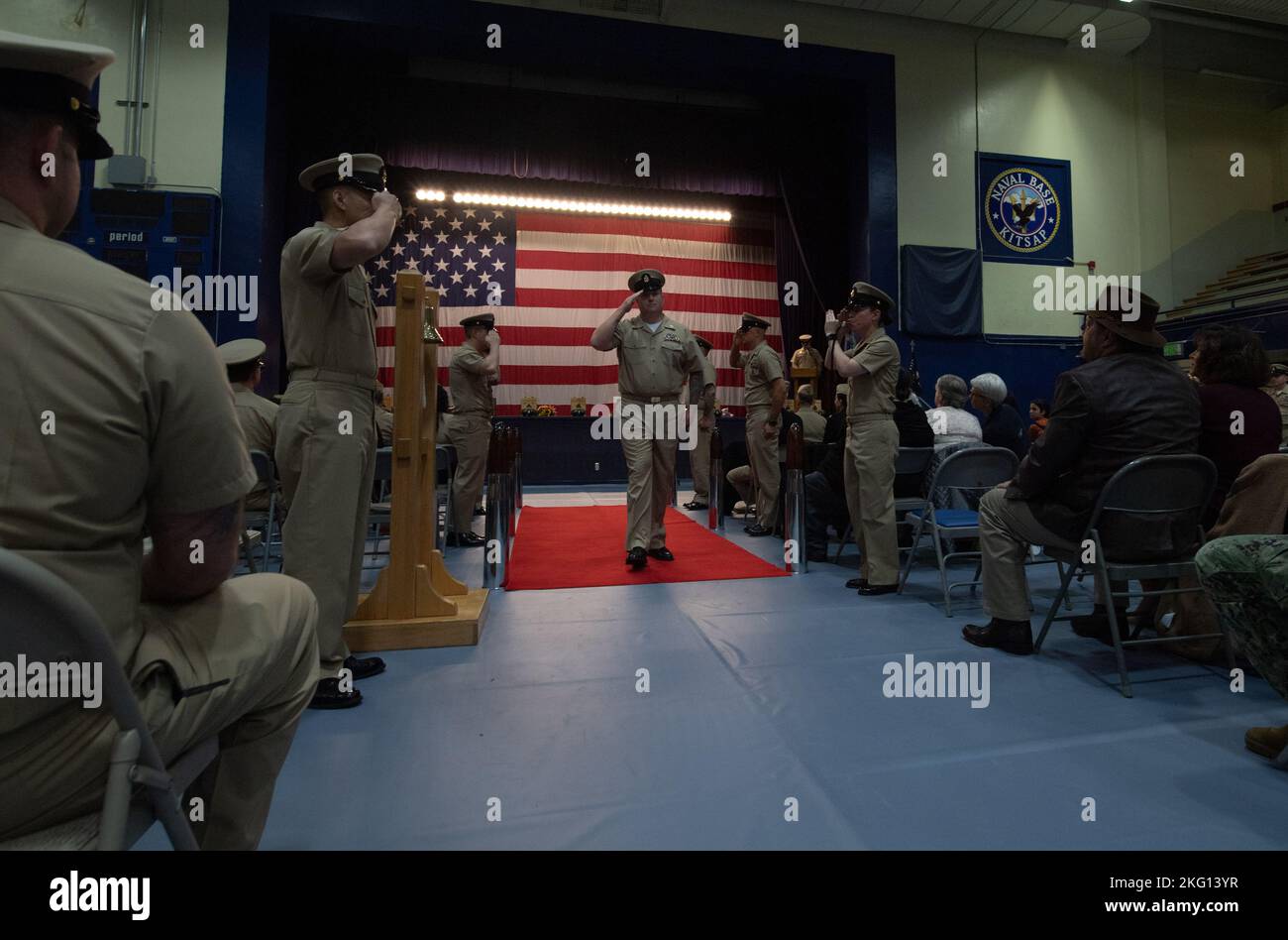 Chief Machinist’s Mate Kyle Bulman walks through sideboys as part of a ...