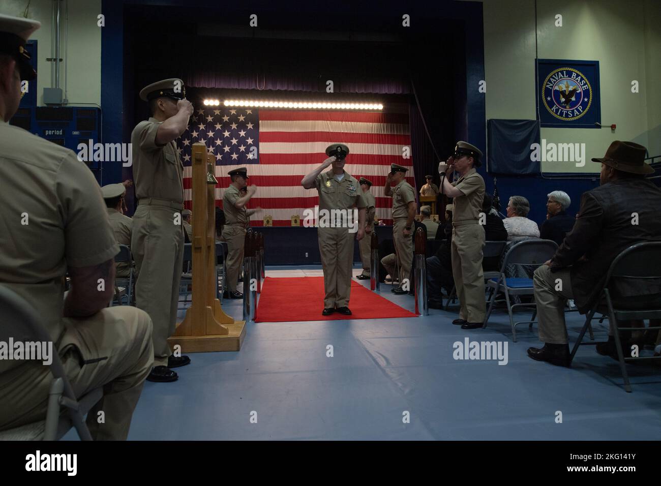 Chief Master-at-Arms Terry Humphries walks through sideboys as part of ...