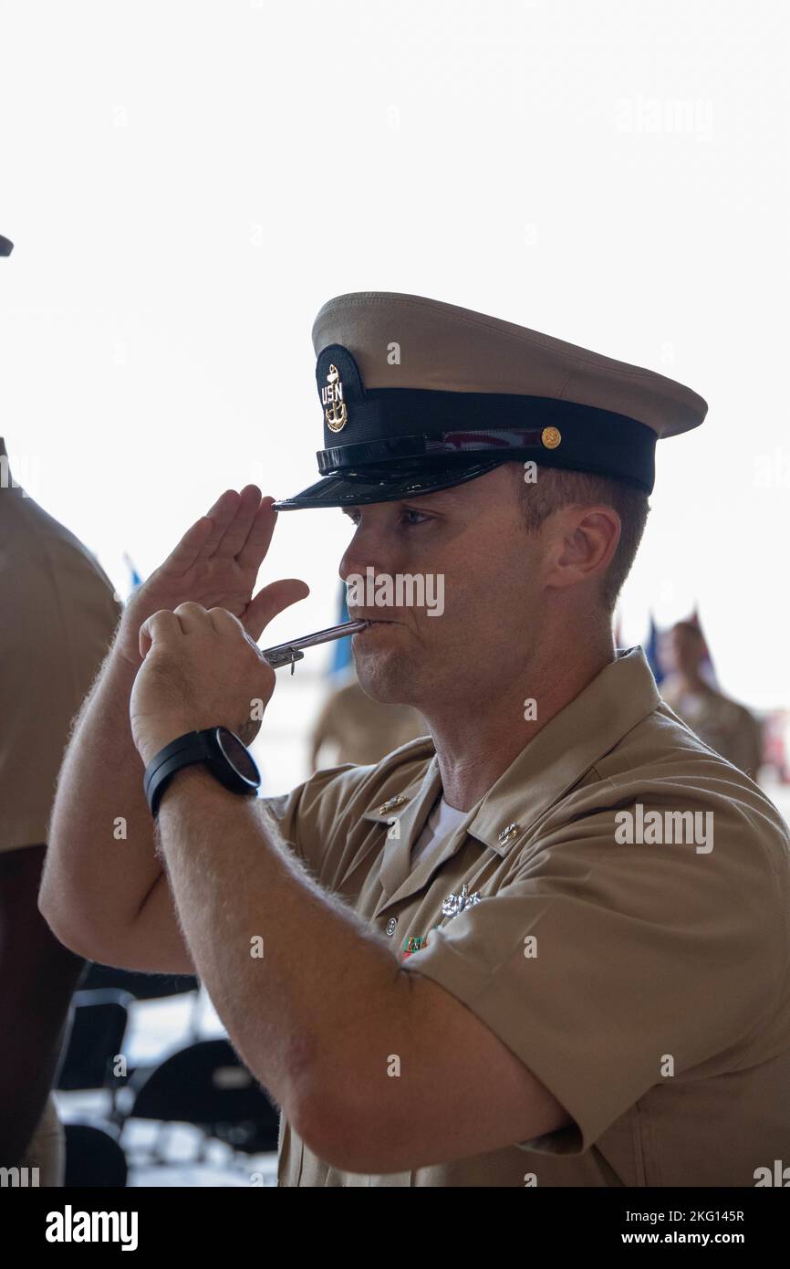 U.S. Navy Sailors participate in a chief petty officer pinning ceremony ...