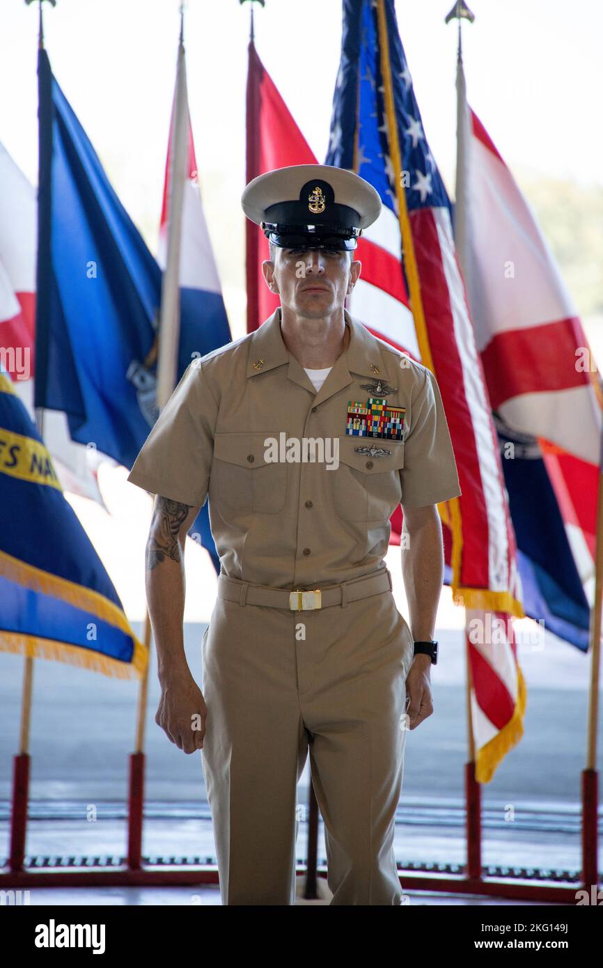 U.S. Navy Sailors participate in a chief petty officer pinning ceremony ...