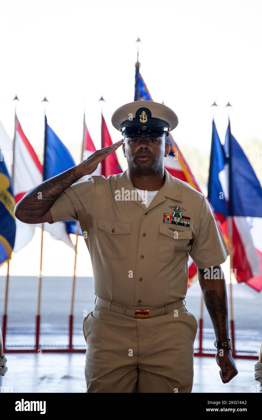 U.S. Navy Sailors participate in a chief petty officer pinning ceremony ...