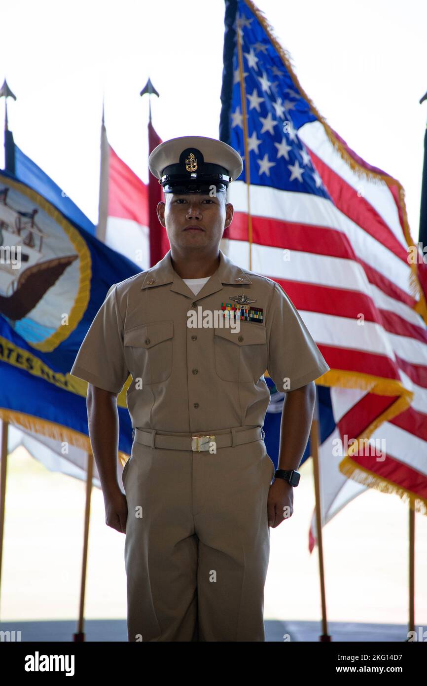 U.S. Navy Sailors participate in a chief petty officer pinning ceremony ...