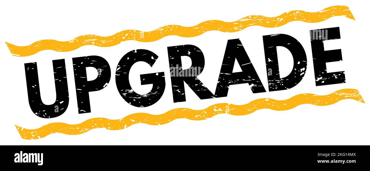 UPGRADE text written on yellow-black lines stamp sign Stock Photo - Alamy