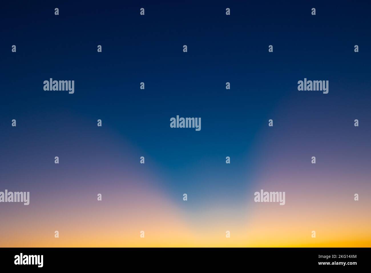 Crespuscular rays on the sky at sunset without clouds. Rare sunset view ...