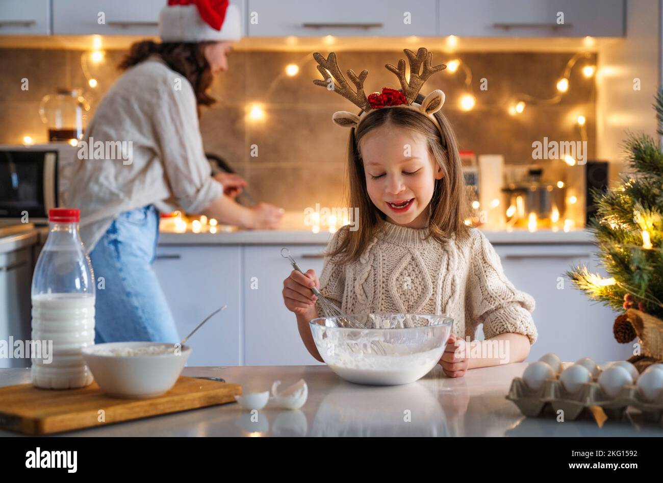 Merry Christmas and Happy Holidays. Family preparation holiday food ...