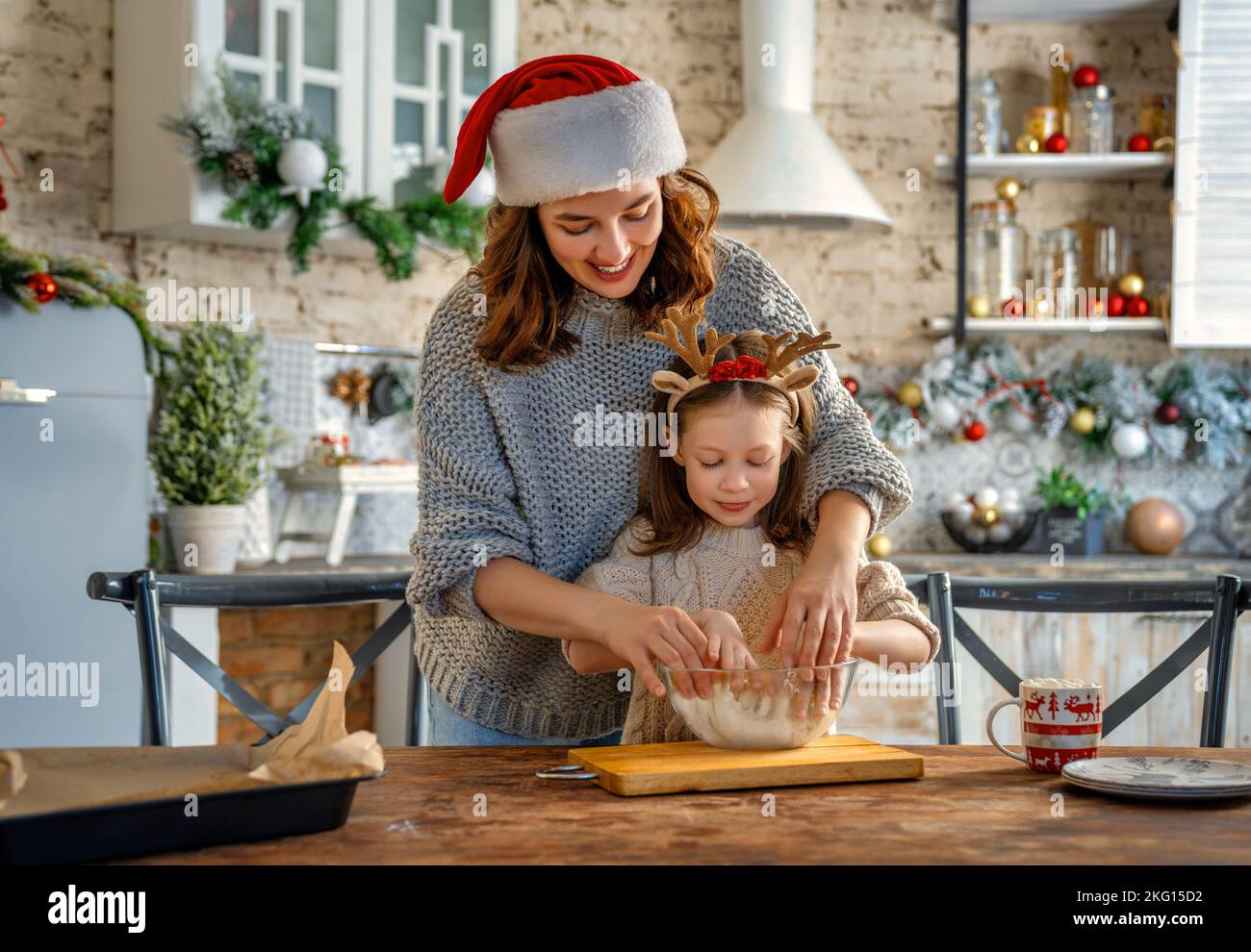 Merry Christmas and Happy Holidays. Family preparation holiday food ...