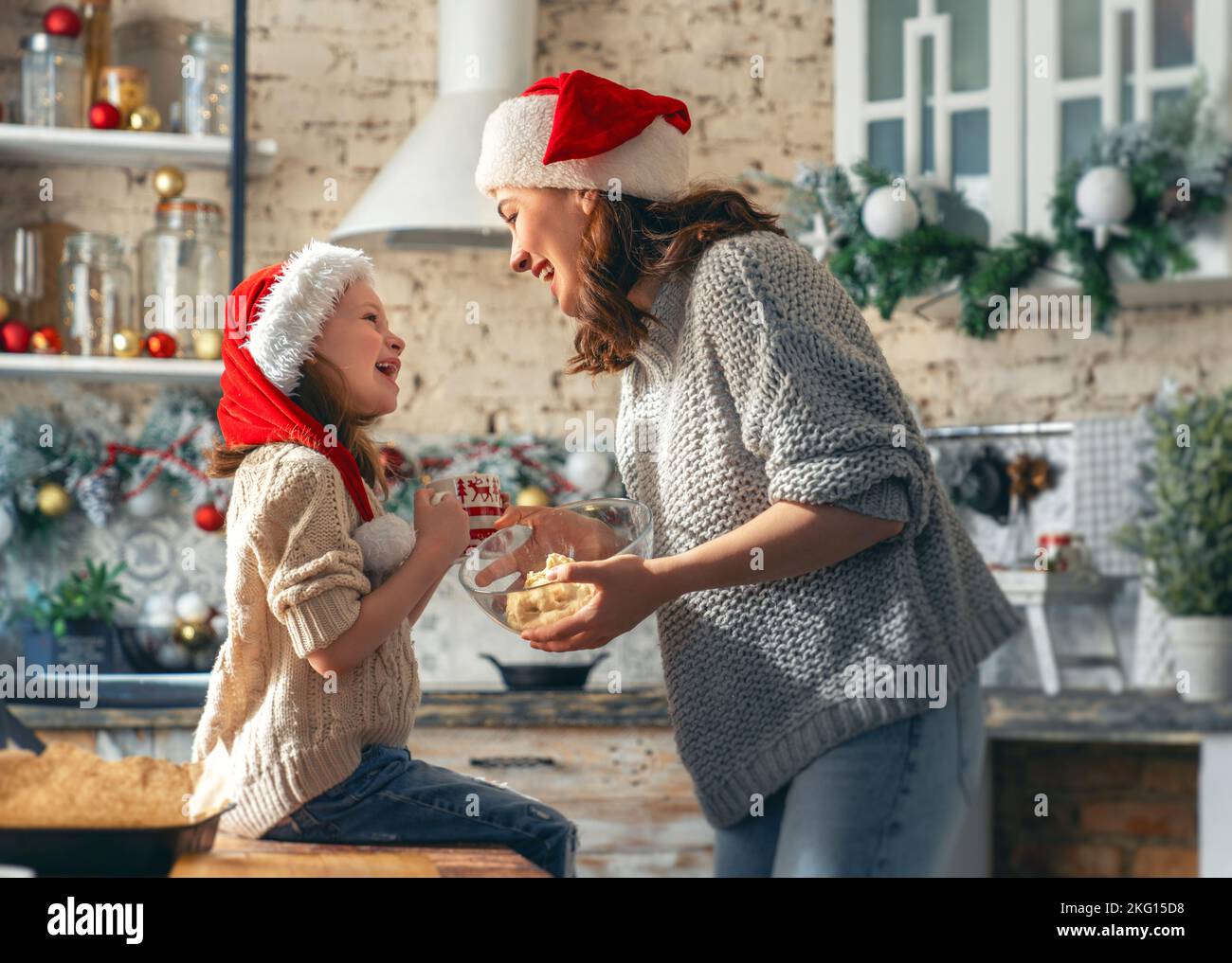 Merry Christmas and Happy Holidays. Family preparation holiday food ...