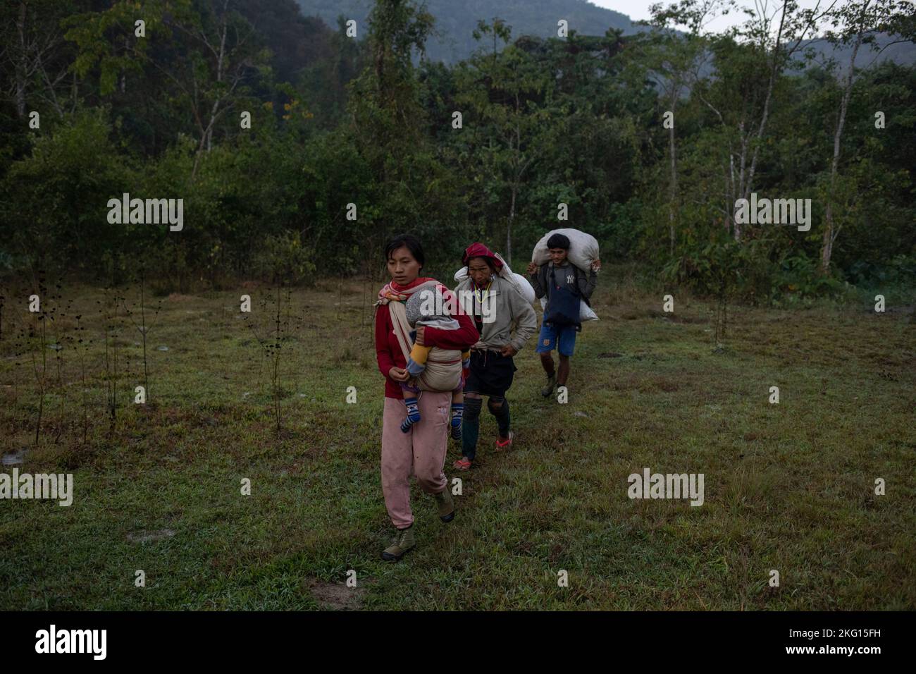 A family flees towards the border with Thailand, in Kayah (Karenni ...