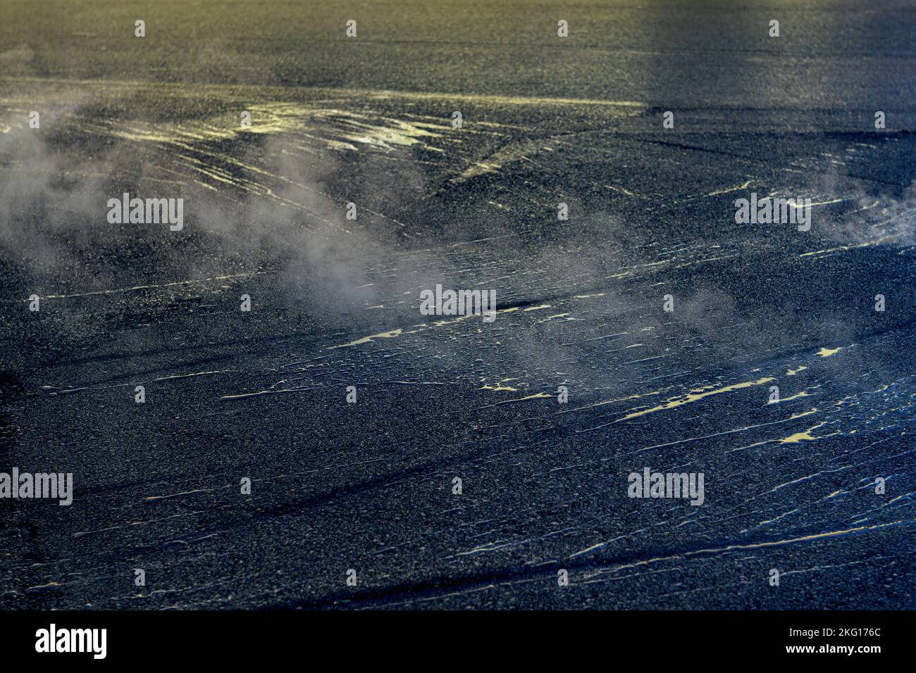 Road construction background. Fresh paving asphalt, road repairing ...