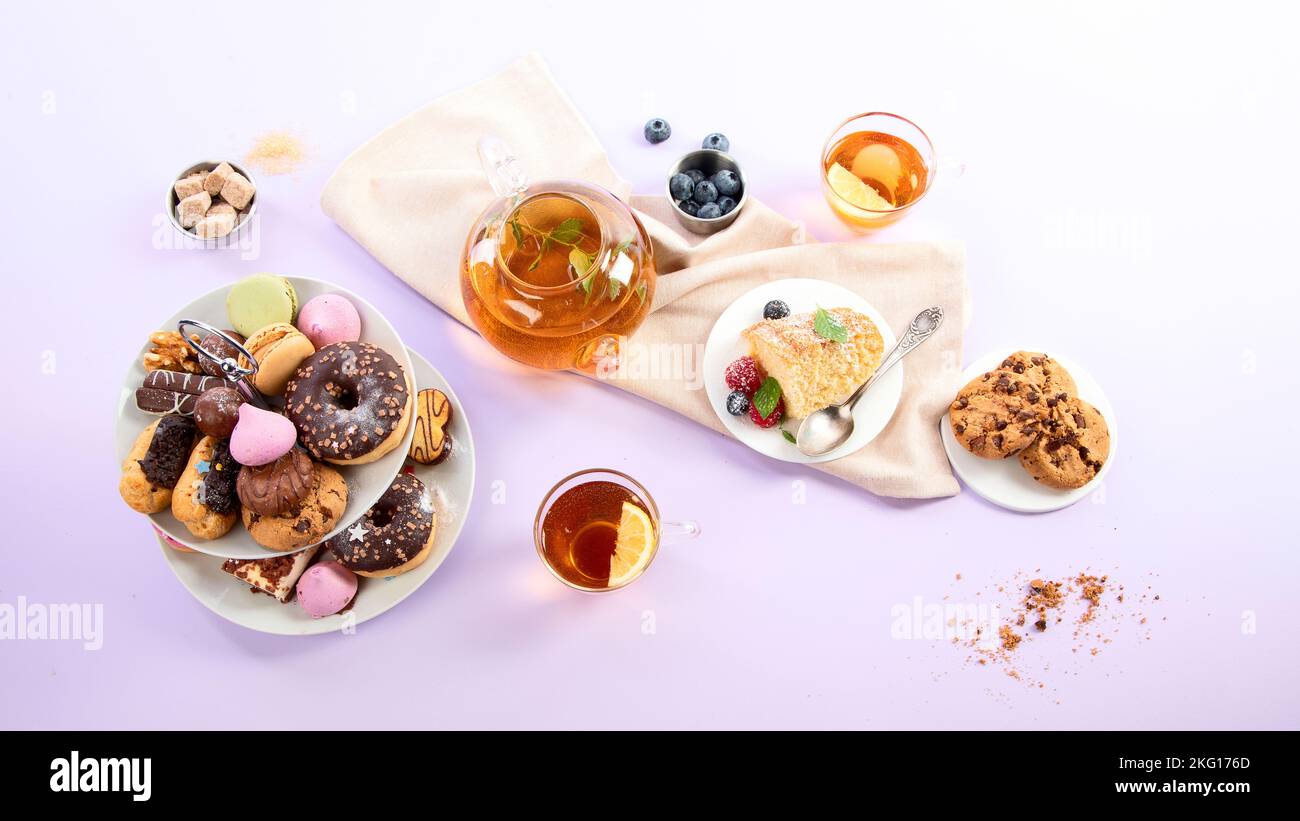 Traditional English tea. Afternoon tea with selection of sweets on ...