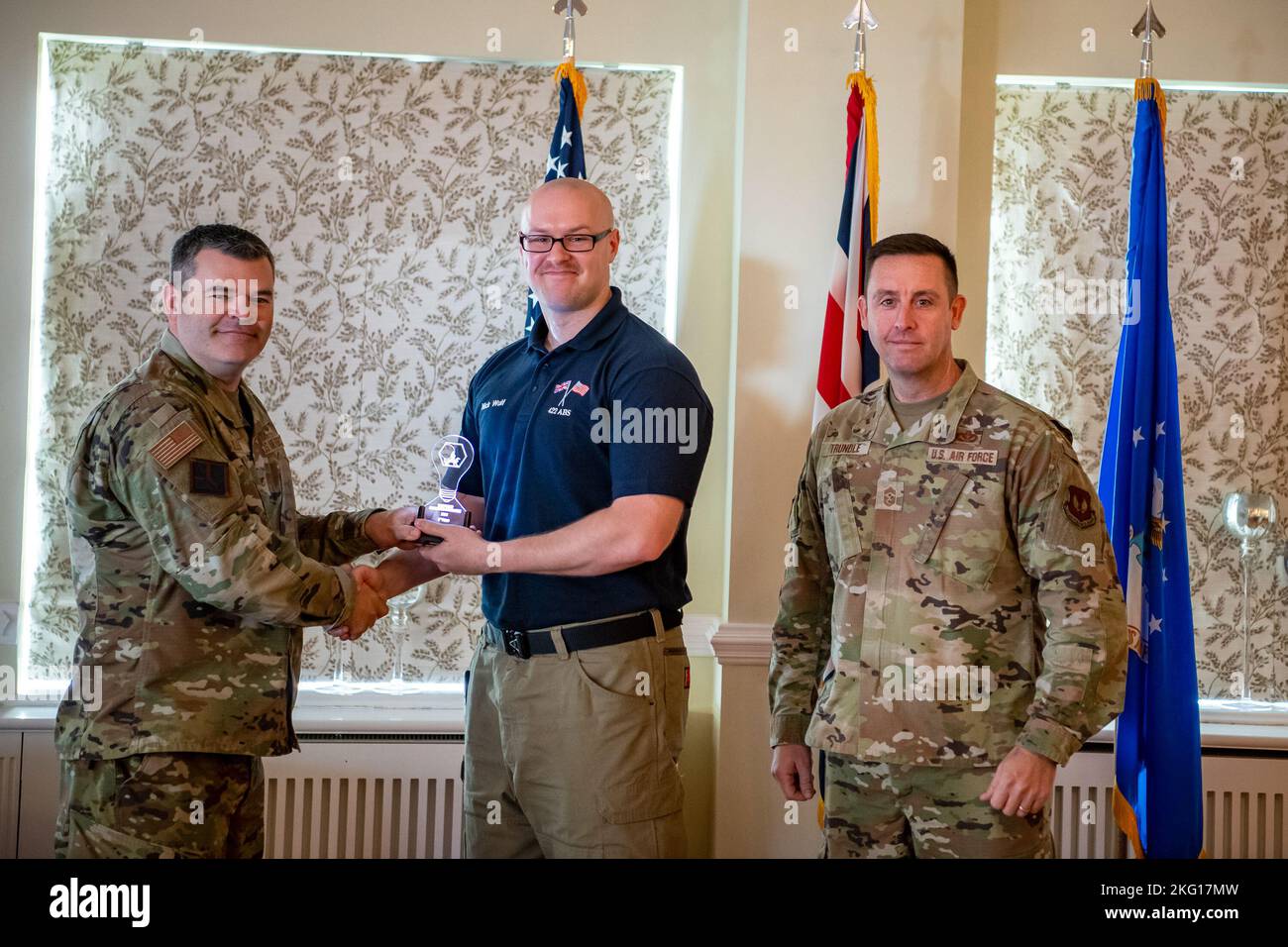 Nicholas Wulf, center, 422d Air Base Squadron supervisory logistics ...
