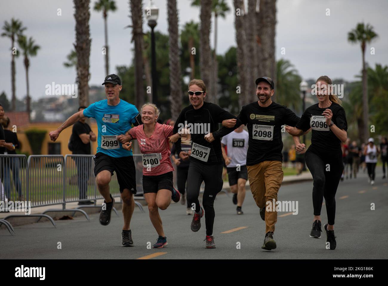 Boot Camp Challenge participants run towards the finish line at Marine ...
