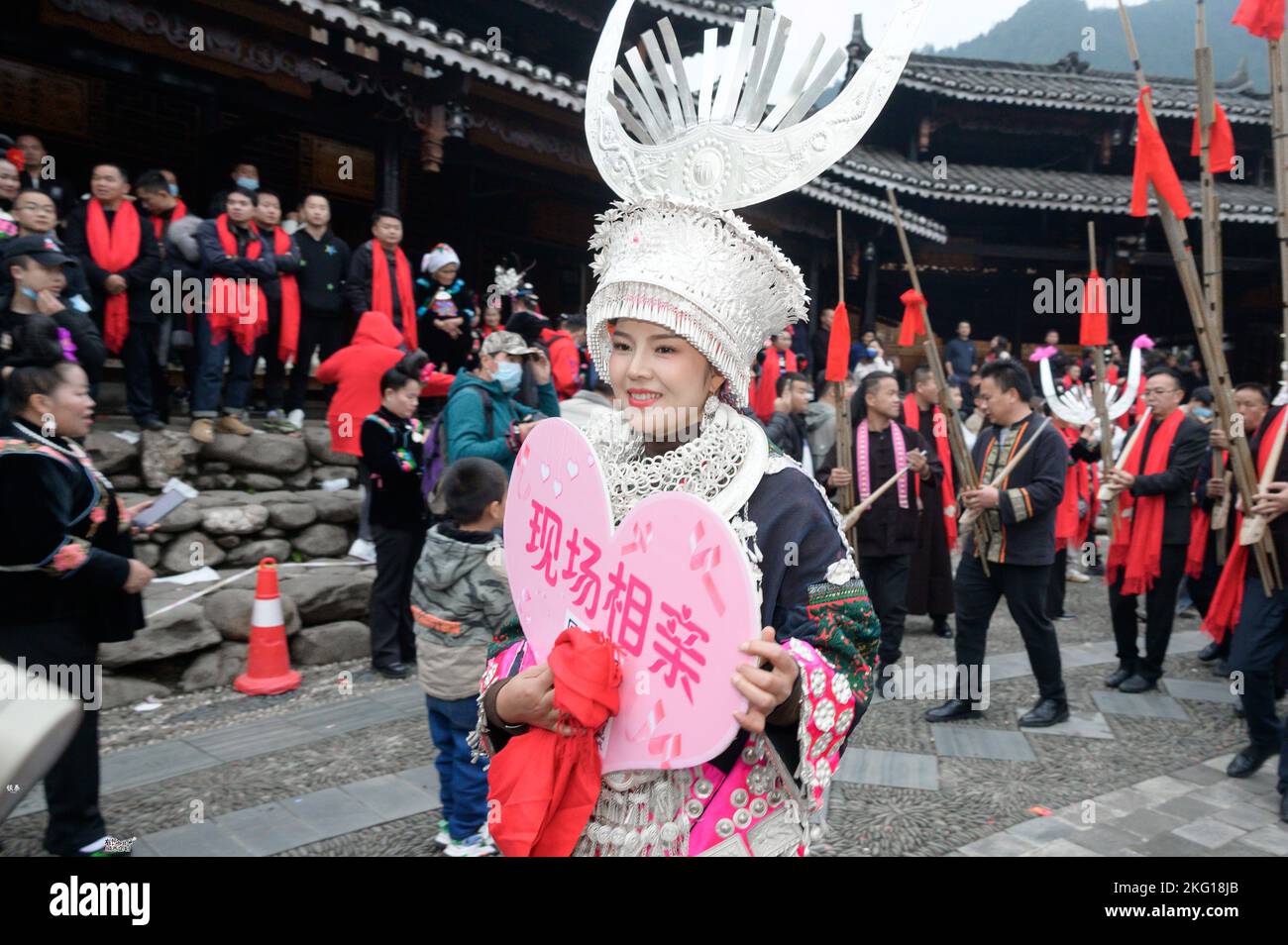The Hmong girls in holiday attire are dancing the traditional Lusheng ...