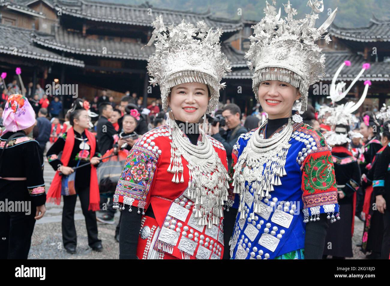 The Hmong girls in holiday attire are dancing the traditional Lusheng ...