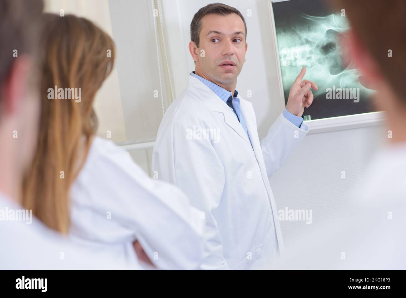 Professional male doctor teaching hi-res stock photography and images ...