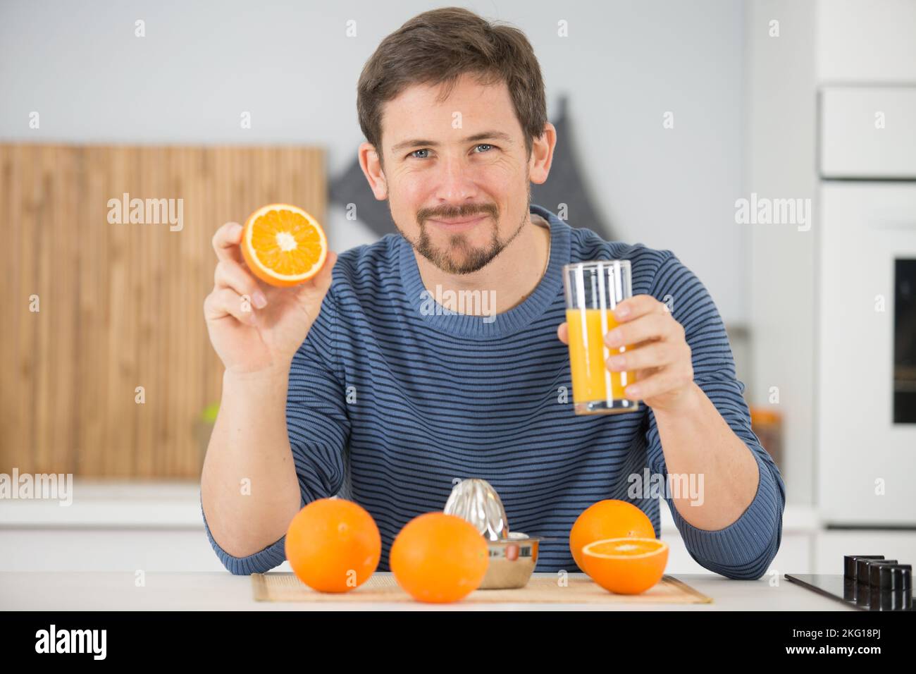 Man drinking orange juice isolated hi-res stock photography and images ...