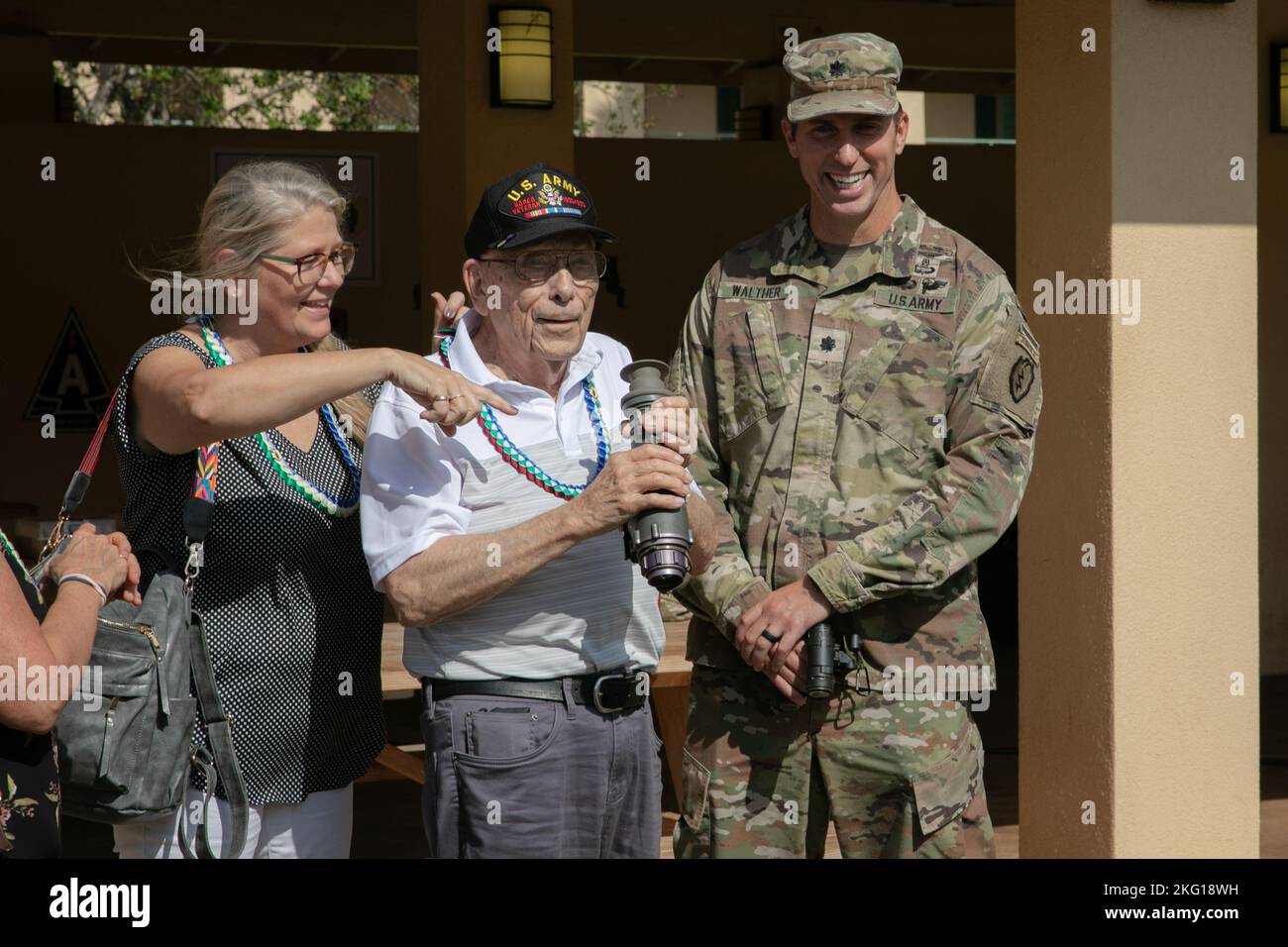 Private 2nd Class (ret.) Warren H. Schuster looks through a PAS-13 ...