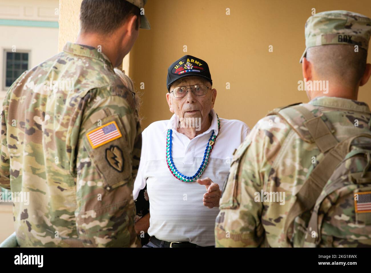 Private 2nd Class (ret.) Warren H. Schuster speaks with Soldiers from ...