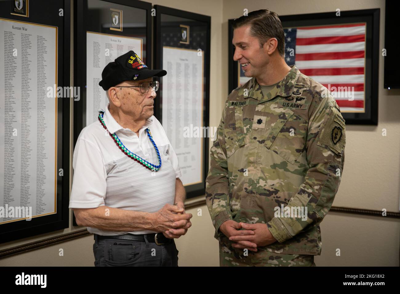 Private 2nd Class (ret.) Warren H. Schuster speaks with Lt. Col. Peter ...
