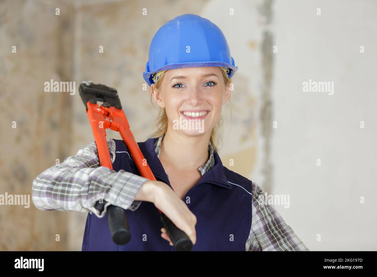 worker woman with big scissors indoors Stock Photo - Alamy