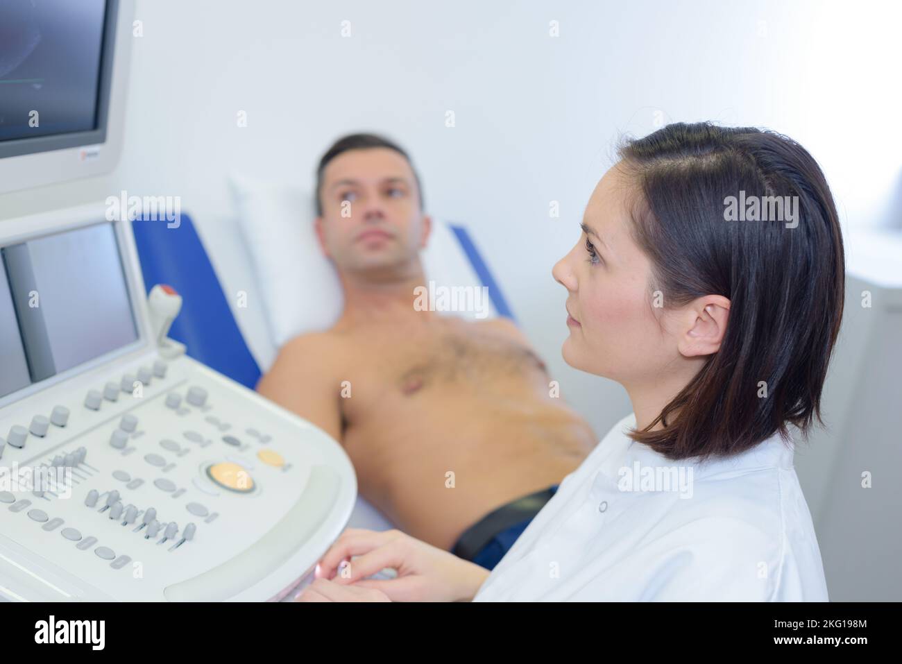 doctor checking screen in hospital Stock Photo - Alamy