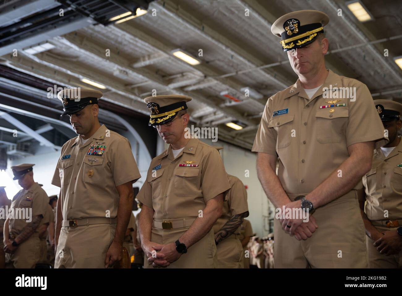Capt. Paul Lanzilotta, center, the first-in-class aircraft carrier USS ...