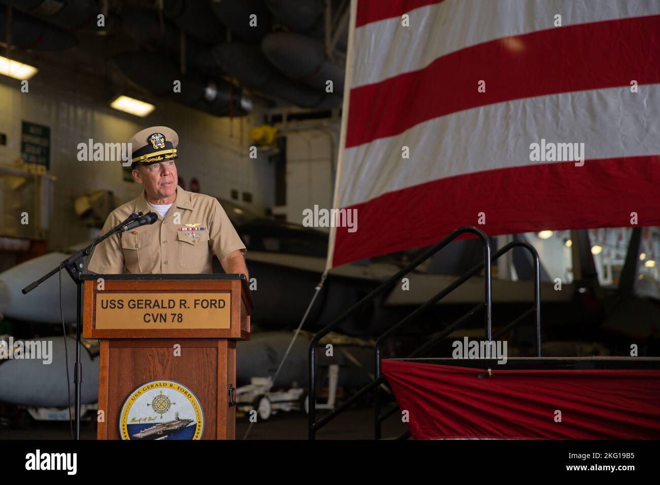 Capt. Daryl Trent, commander, Carrier Air Wing (CVW) 8, delivers ...