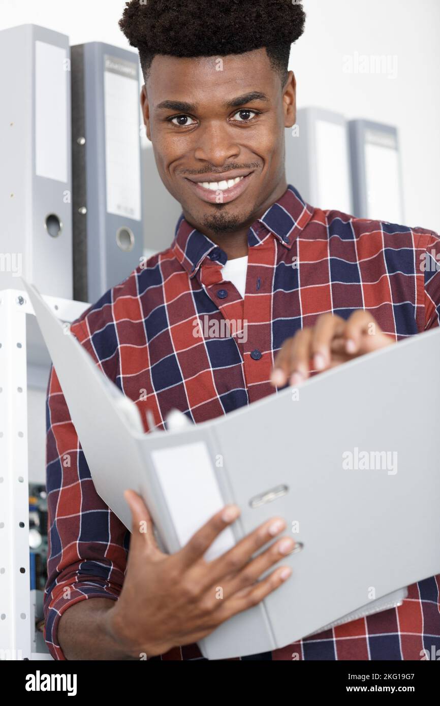 student with folders and books Stock Photo - Alamy