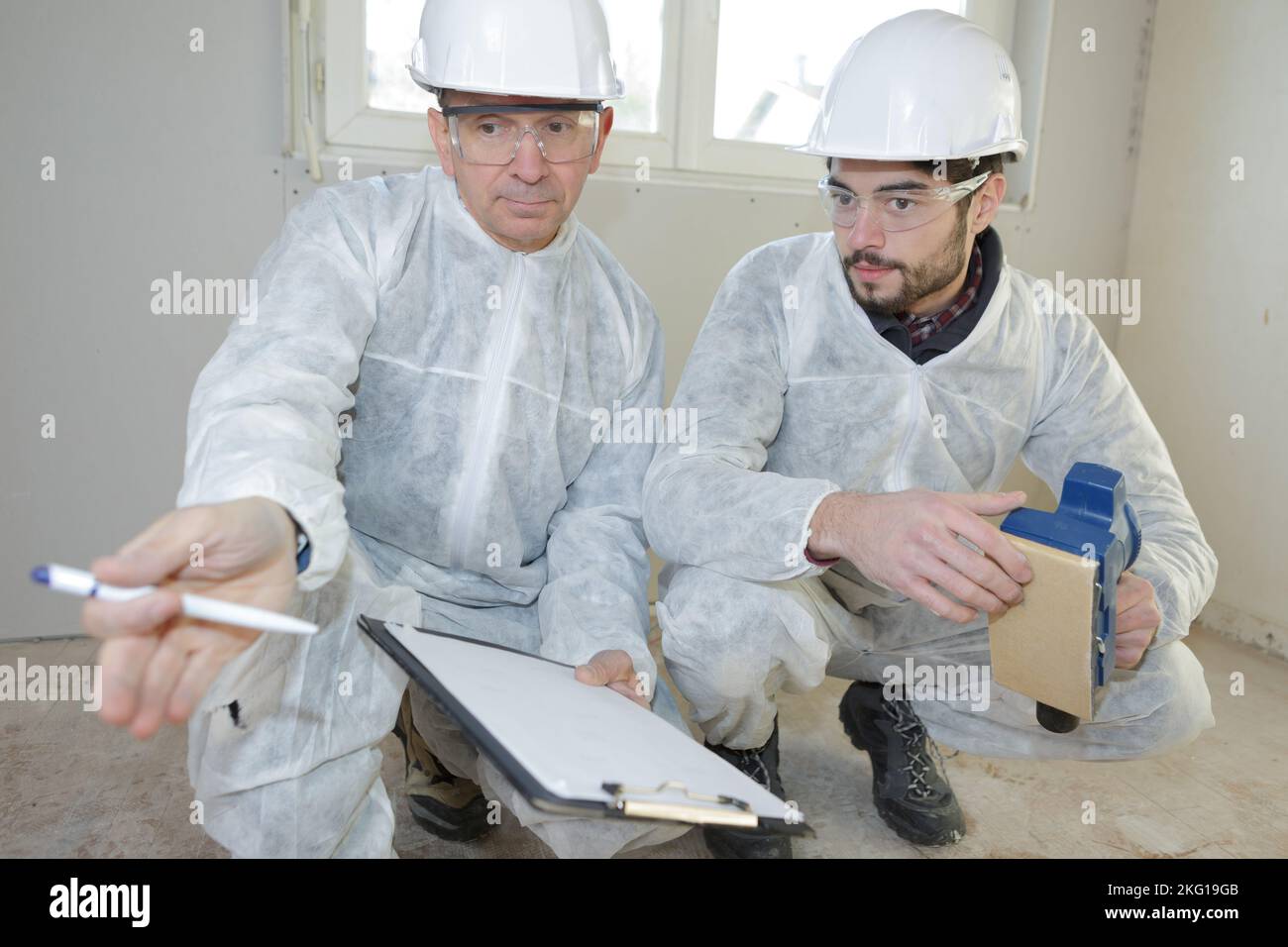 two engineers working Stock Photo - Alamy