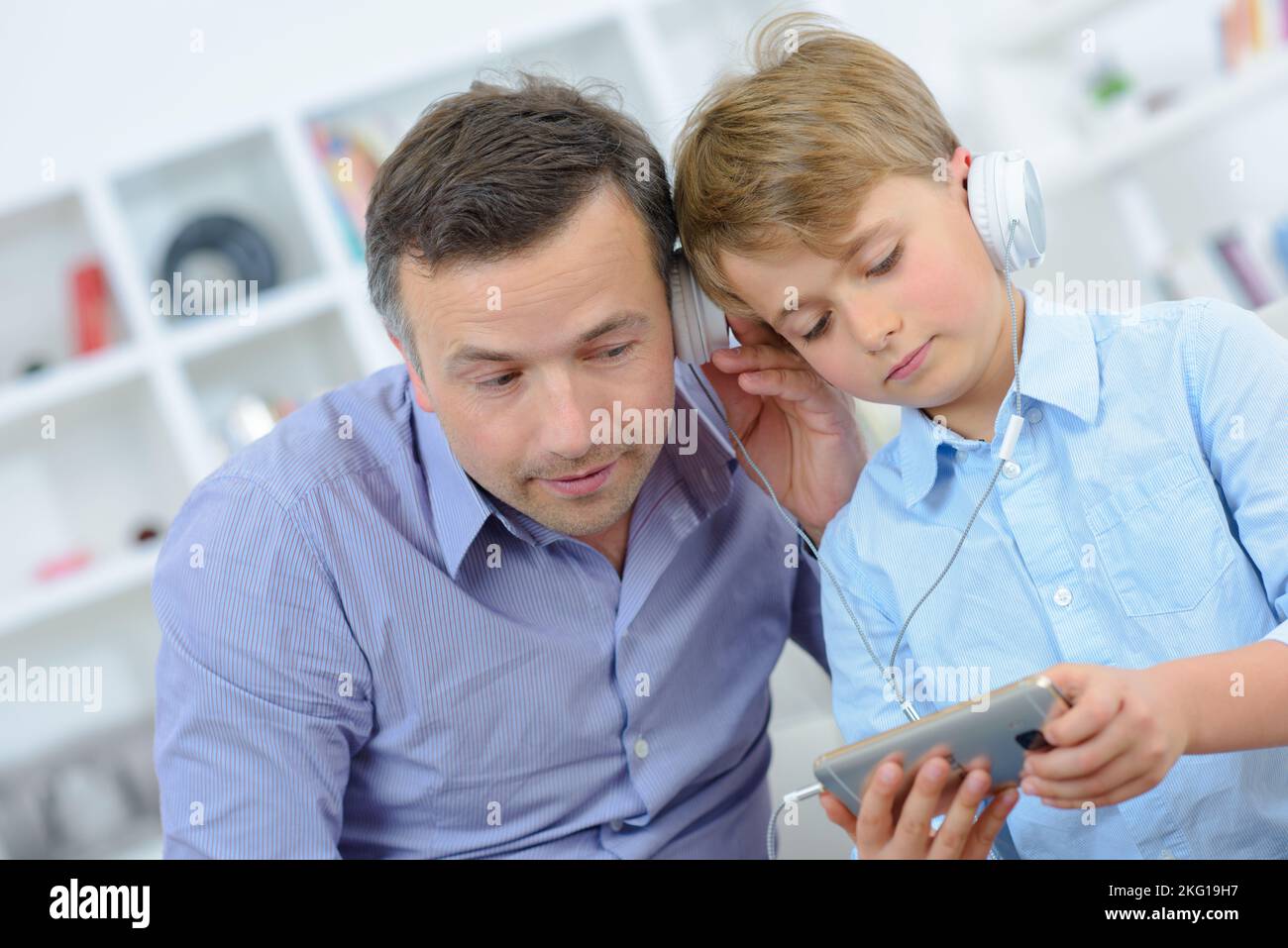 a portrait of a father and his son Stock Photo - Alamy