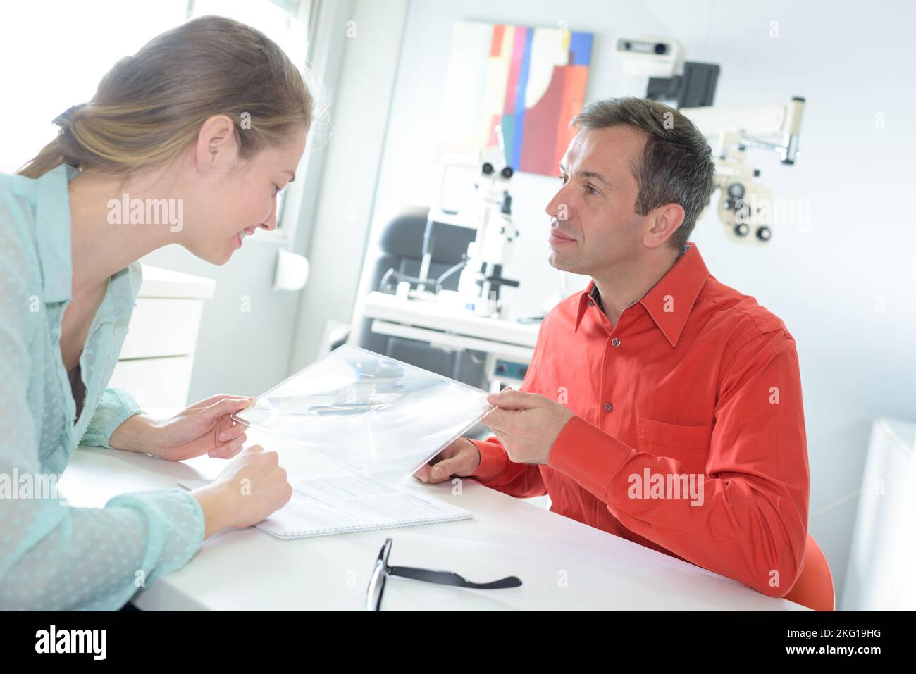 Reading during eyesight examination hi-res stock photography and images ...