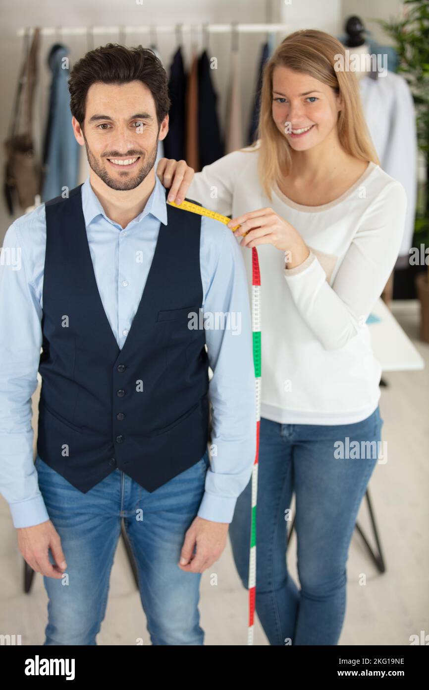 Dressmaker taking measurements design hi-res stock photography and ...