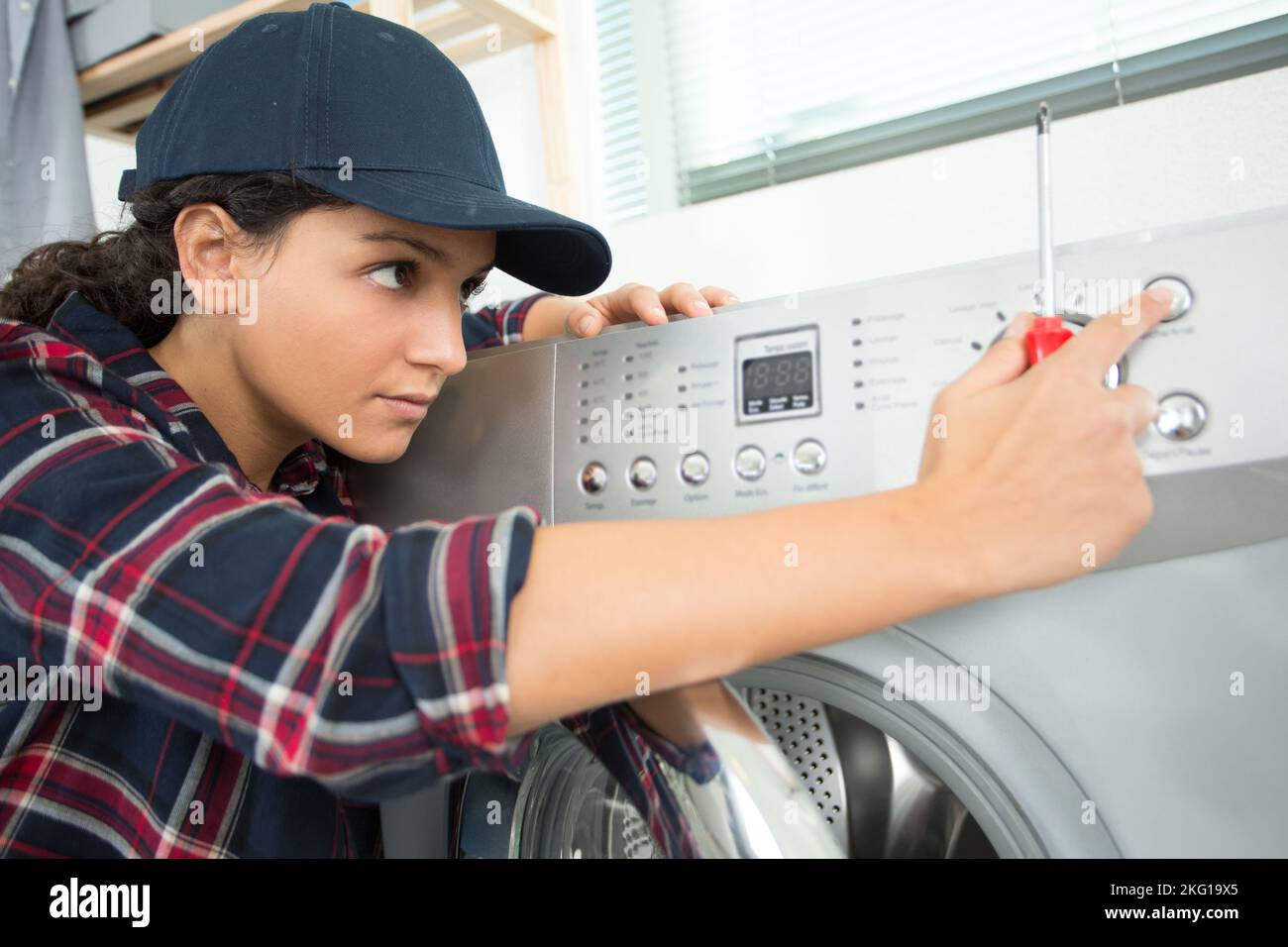 Broken washing machine hose hi-res stock photography and images - Alamy