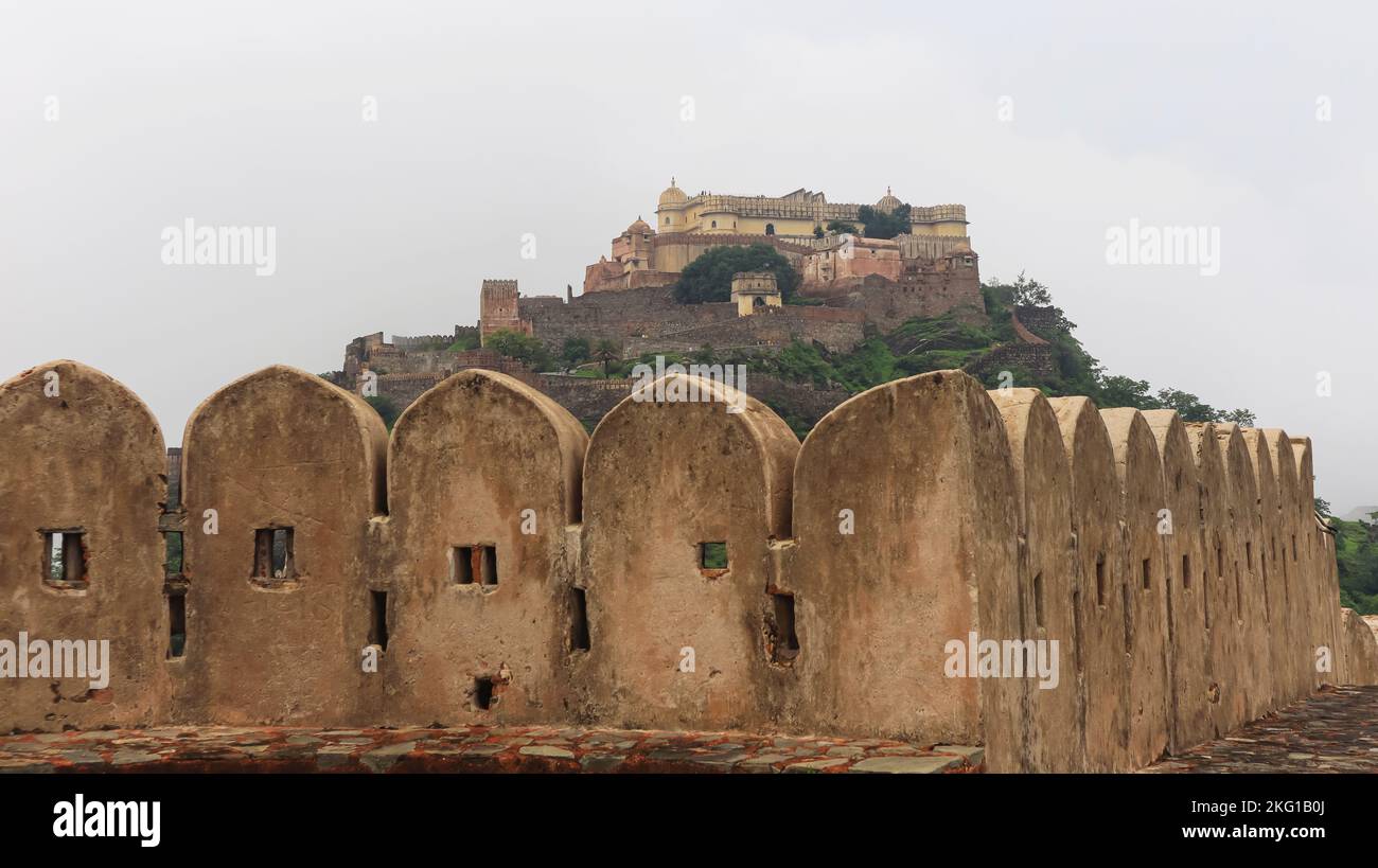 Thick protection walls with Kumbhalgarh Fort at the back, Rajasthan ...