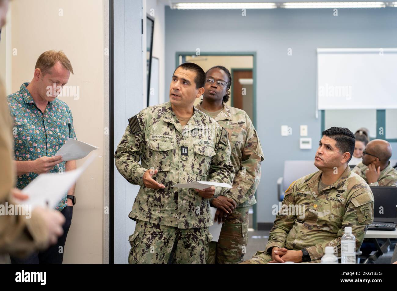 Military and civilian students attend the CFE-DM Humanitarian ...