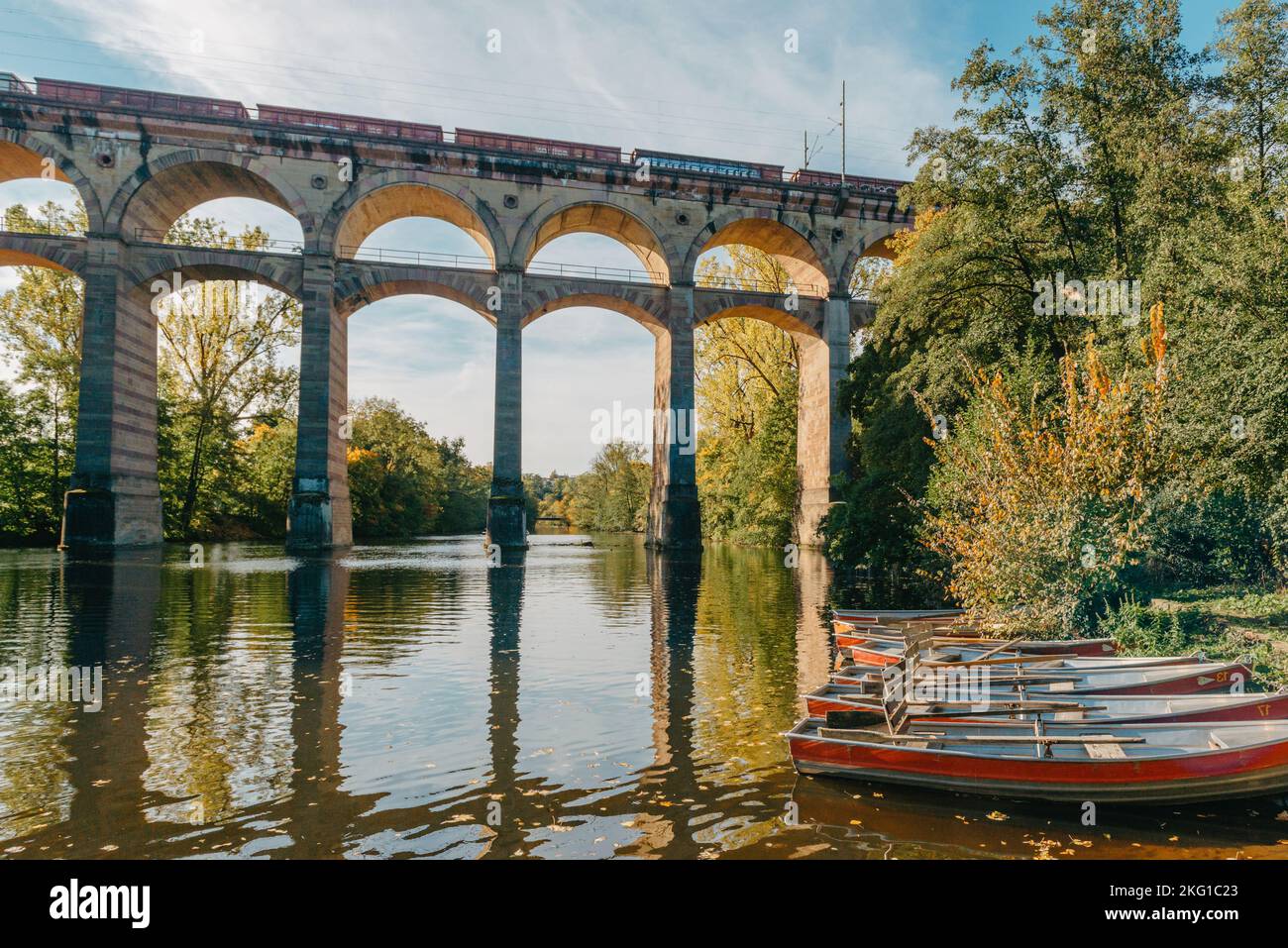 Germany train passing train bridge on cloudy day in germany hi-res ...