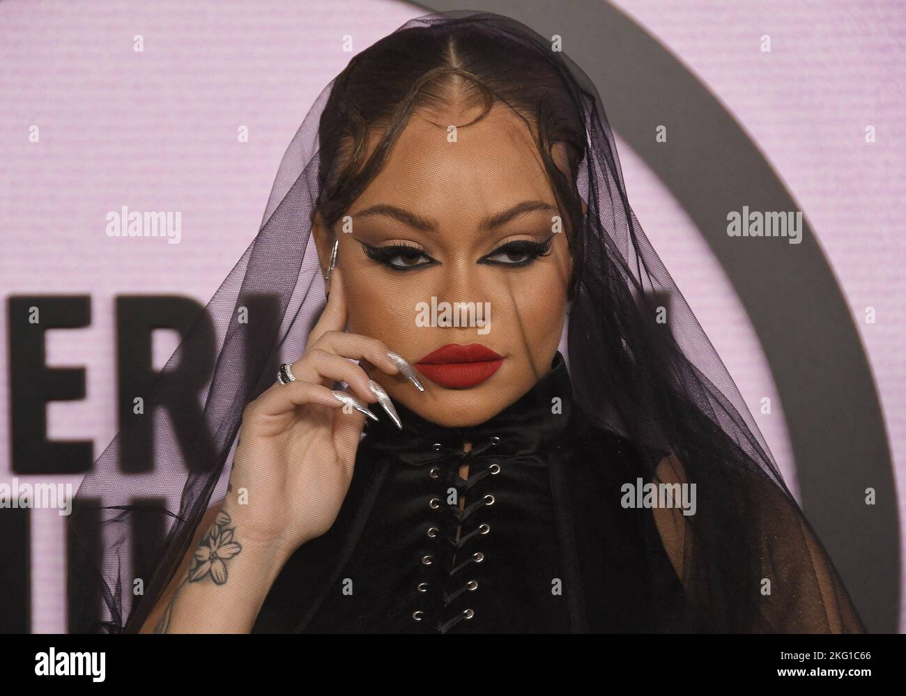 Latto arrives at the 2022 American Music Awards held at the Microsoft ...