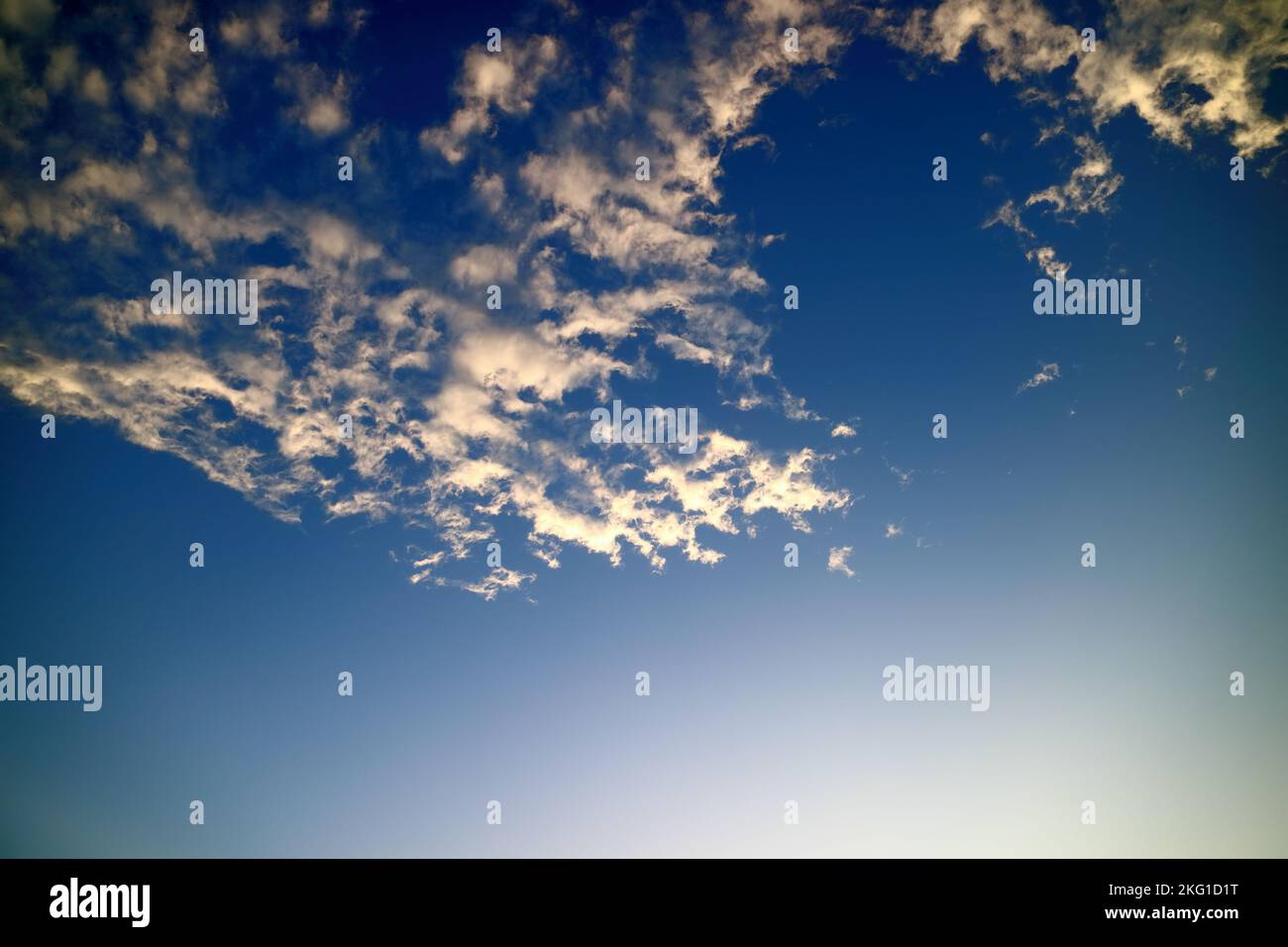Clouds drifting across blue sky hi-res stock photography and images - Alamy