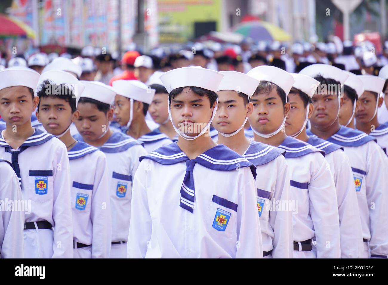 Indonesian junior high school students participating in marching (baris ...