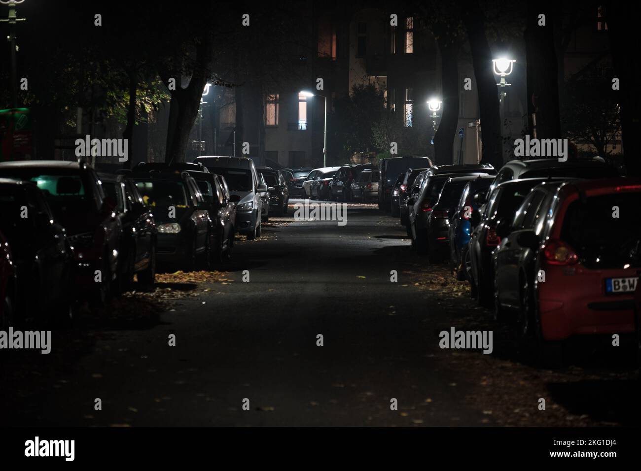 A dark street in Berlin, a street in the dark nighttime in Berlin. A ...