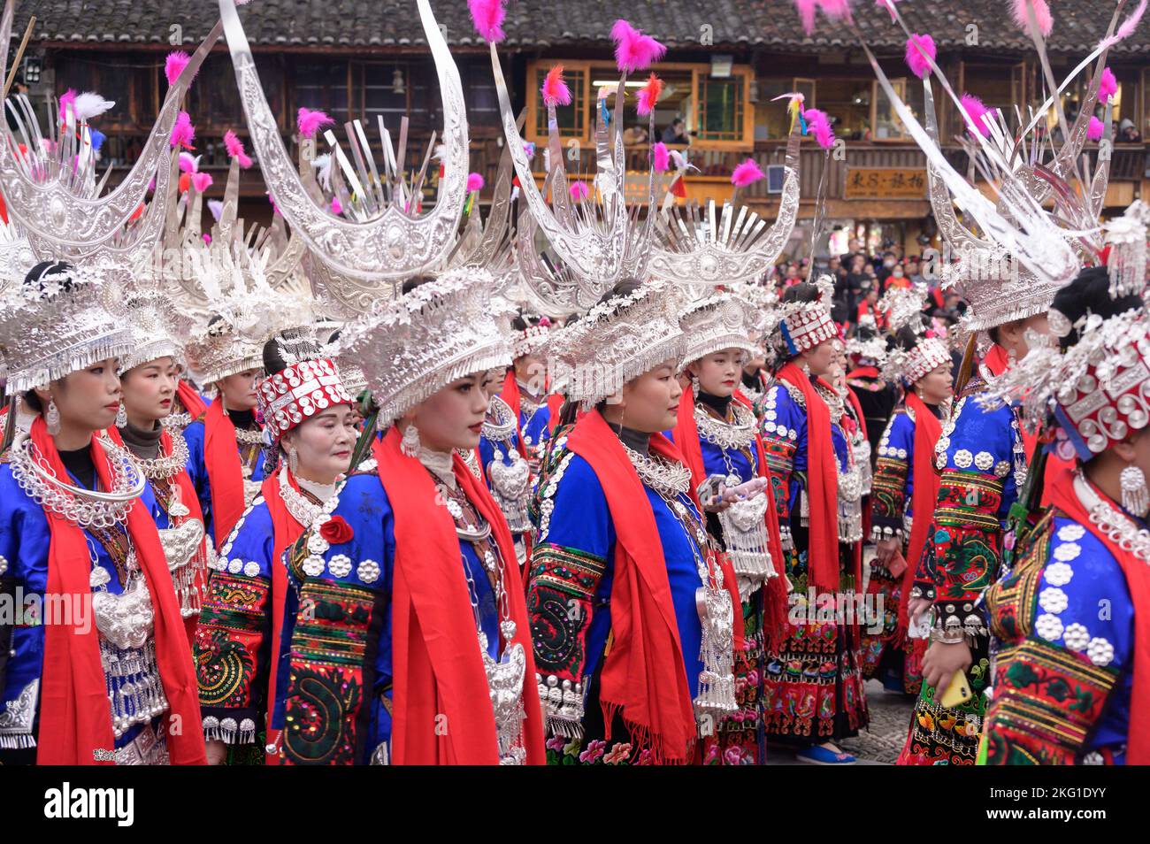 The Hmong girls in holiday attire are dancing the traditional Lusheng ...