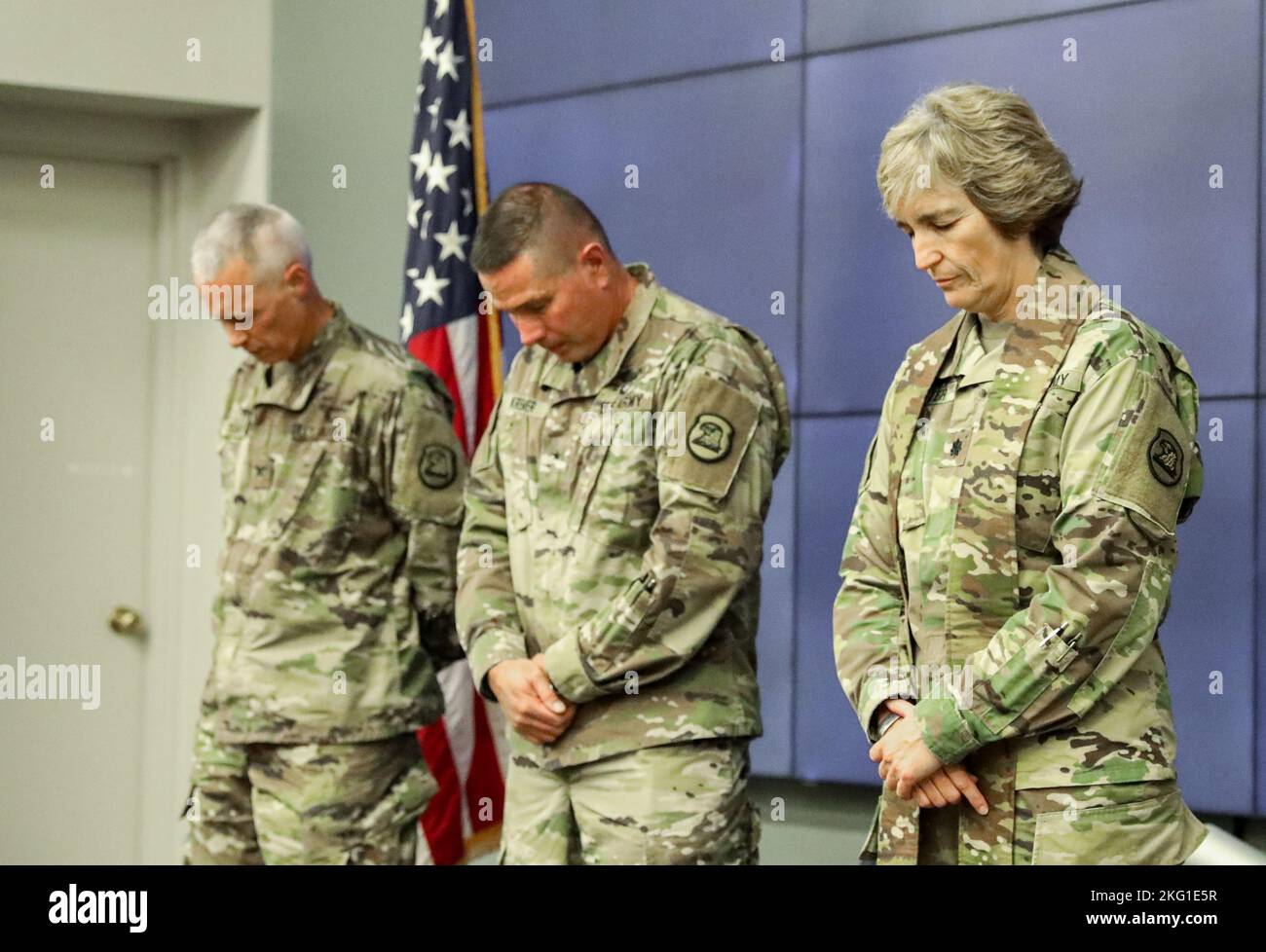 Chaplain (Lt. Col.) Martha Kester prays as an invocation is read during a Passing of the Stole ...