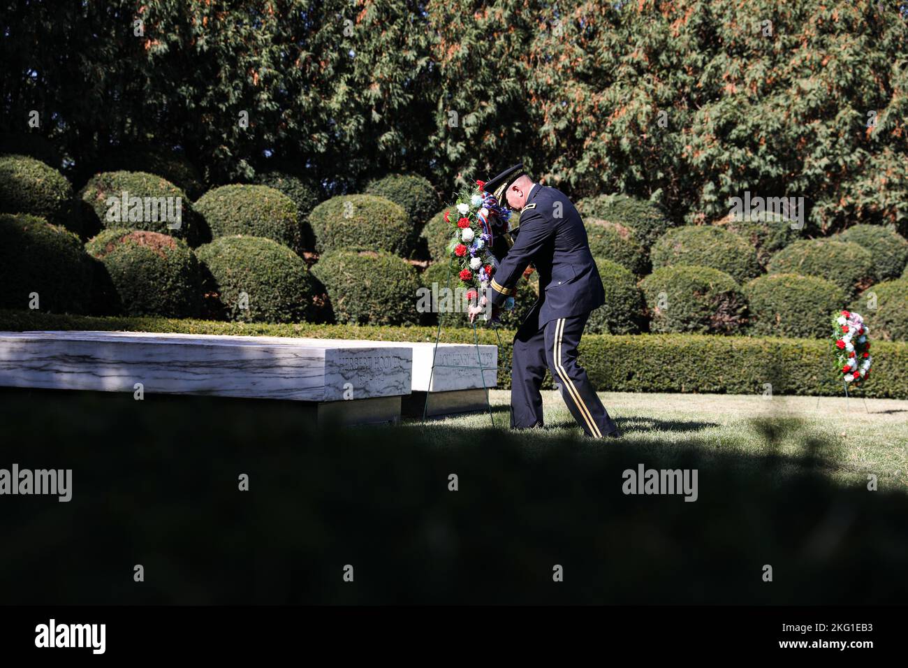 Brig. Gen. Steven Kremer salutes after presenting a wreath during a ...