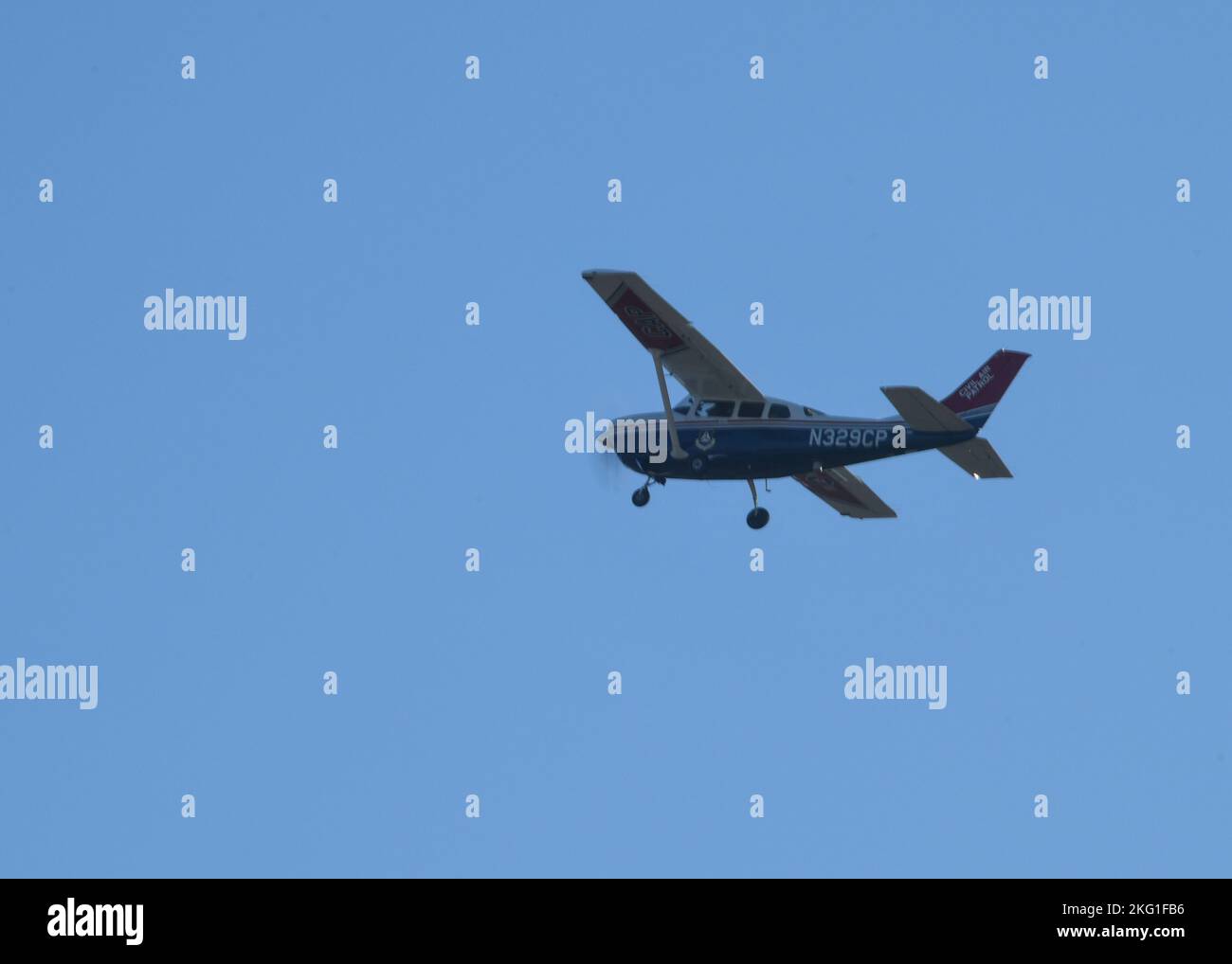 A Michigan Wing Civil Air Patrol Cessna 182 Skylane flies during a ...