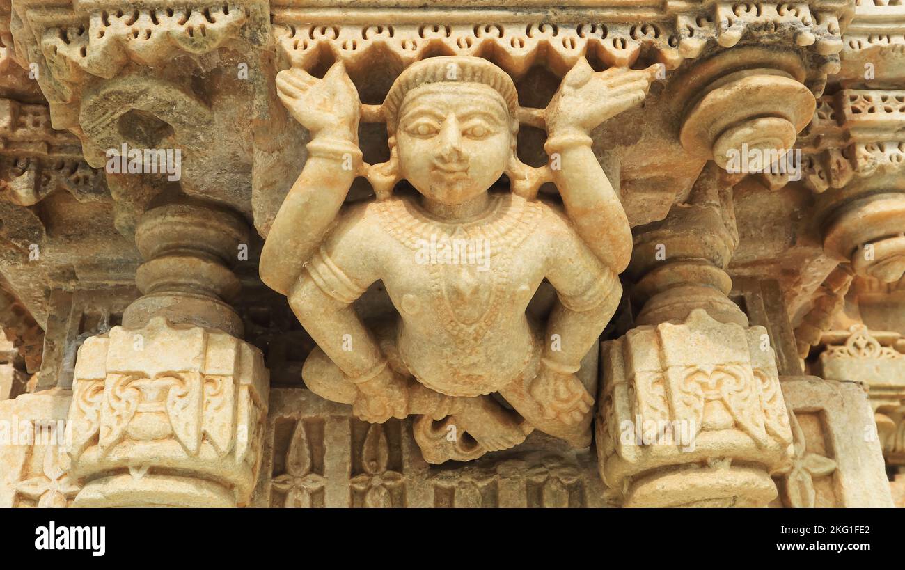 Dwarf holding pillar capital on the Neminath Jain Temple, Ranakpur ...