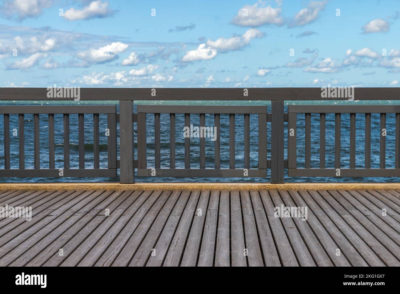 Empty promenade background with wooden floor and railings mounted at ...