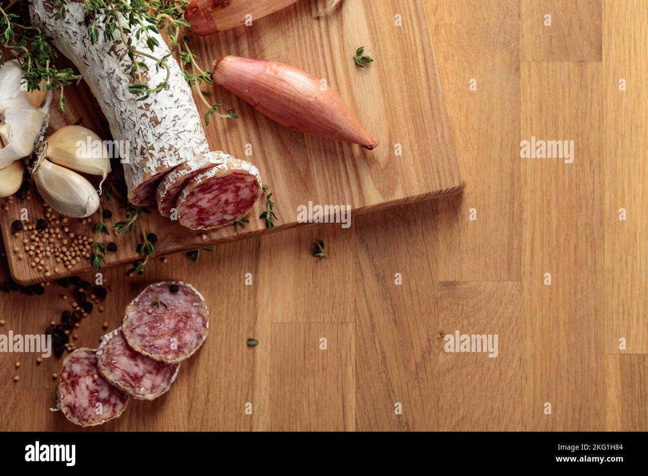 Traditional dry-cured sausage with thyme, garlic, onion, and spices ...