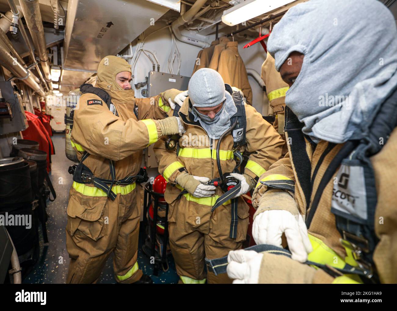 SEA OF JAPAN (Oct. 22, 2022) Sailors don firefighting gear during a ...